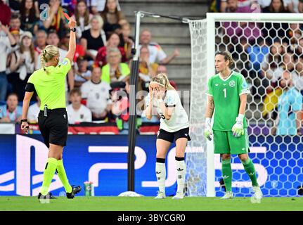 referee Tess Olofsson shows red card to Kathrin-Julia Hendrich #3 of ...