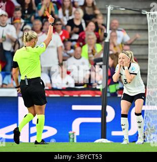 referee Tess Olofsson shows red card to Kathrin-Julia Hendrich #3 of ...