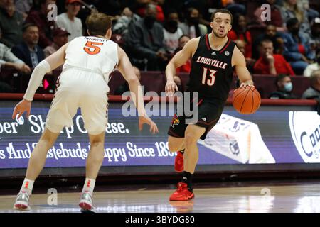 March 1, 2022: Louisville Cardinals guard Noah Locke (0) looks to drive ...