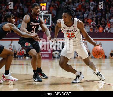 March 1, 2022: Louisville Cardinals forward JJ Traynor (12) is blocked ...