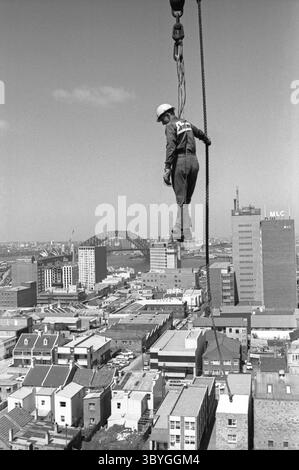 Italian workman Bruno Verdolin driving a crane in the building site of ...