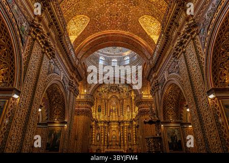 Dome and altar with golden interior of the Compania de Jesus (Society ...