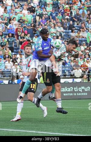 Seattle Sounders FC defender Jon Bell (15) wrestles Inter Miami ...