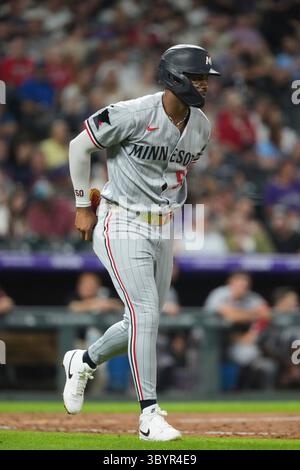 Colorado Rockies second baseman Willi Castro, front center, leads ...