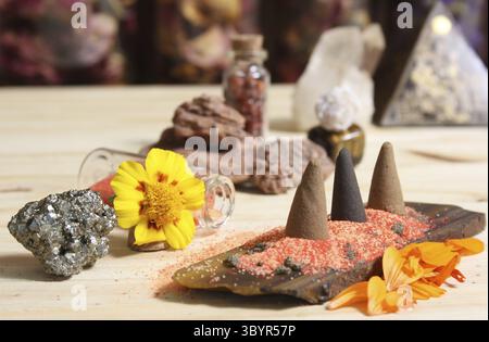 Incense Cones on Stone Slab With Chakra Crystals and Flowers Stock ...