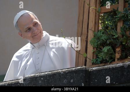 Pope Leo XIV looks out of the window of a helicopter as he arrives at ...