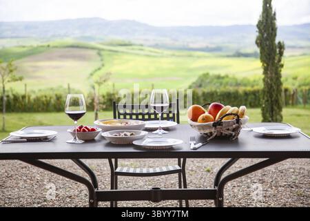 Lunch with a view - table against beautiful landscape in Tuscany Stock ...