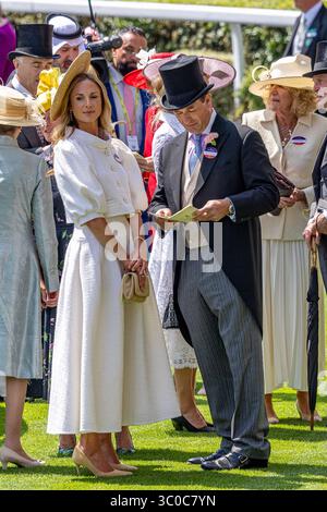 King Charles III with Mike Tindall (second left) and Zara Tindall ...