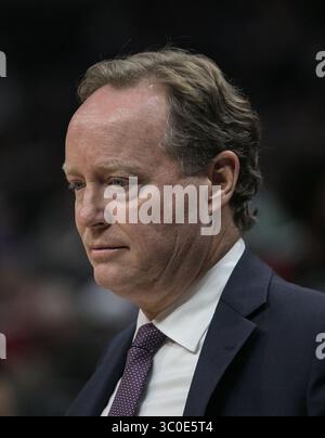 Milwaukee Bucks coach Mike Budenholzer stand aside the court during NBA ...