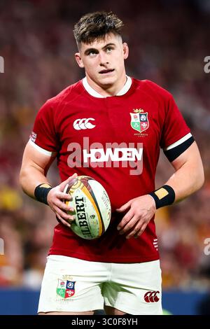 Dan Sheehan of the British & Irish Lions, center, goes on the charge ...