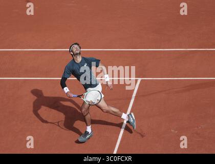 Lorenzo Musetti, an Italian tennis player, during a match at the Hong ...