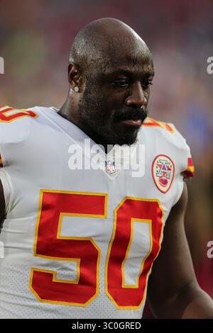 Los Angeles Rams linebacker Justin Hollins (58),left, and middle ...