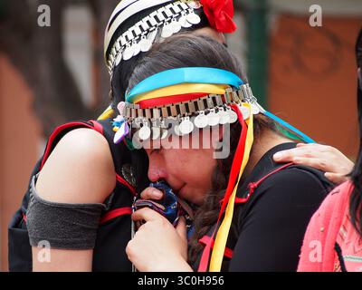 A Mapuche indian girl crying when hundred indigenous women from 20 ...
