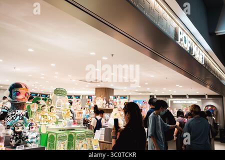 Customers browse blind box toys at a POP MART store in The Londoner ...