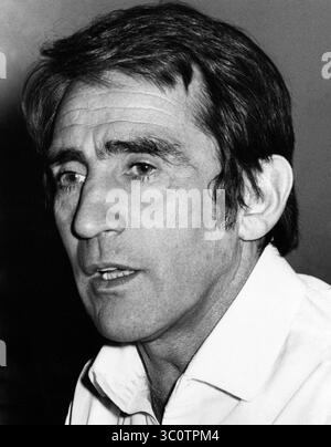 Italian actor Walter Chiari (Walter Annichiarico) handing out a dish to ...