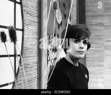 Italian actress and scriptwriter Franca Valeri (Franca Norsa) measuring ...