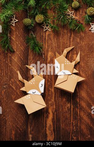 Handmade origami paper craft Christmas tree on red background Stock ...