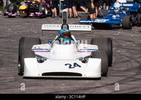Hesketh 308 Formula 1 race car before driving up the hillclimb track at ...