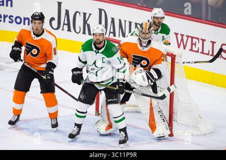 Philadelphia Flyers' Carter Hart waits before an NHL hockey game ...