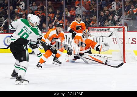 Philadelphia Flyers' Carter Hart waits before an NHL hockey game ...