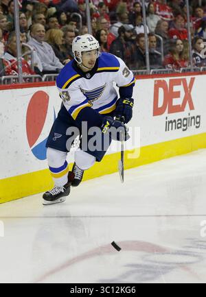 St. Louis Blues' Jordan Kyrou (25) chases after a loose puck as Ottawa ...