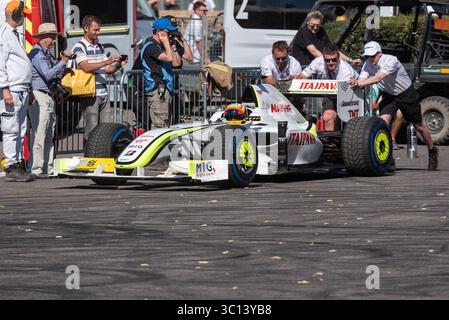 Brawn BGP 001 historic Formula 1 racing car driving up the hillclimb at ...