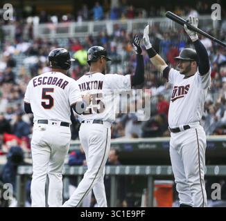 Minnesota Twins' Byron Buxton, right, hits a grand slam in the fifth ...