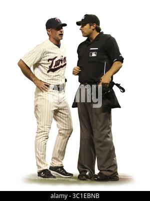 Home plate umpire Mark Ripperger, center, gets between Toronto Blue ...
