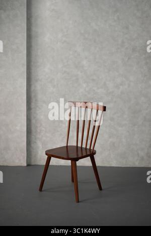 Elegant grey Scandinavian style chair and minimal wood console table in ...