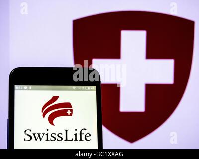 In this photo illustration a Swiss Life Group logo seen displayed on a ...