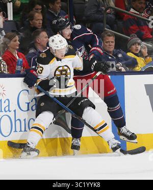 Columbus Blue Jackets' Zach Werenski (8) chases Edmonton Oilers' Jack ...