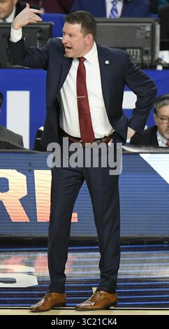 Texas coach Chris Beard yells out to his players during the first half ...