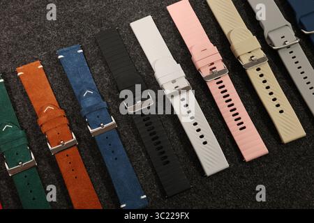 Colorful Watch Straps Collection Displayed on Dark Surface Stock Photo ...