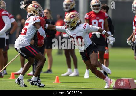 San Francisco 49ers' Upton Stout and teammates gang-tackle Los Angeles ...
