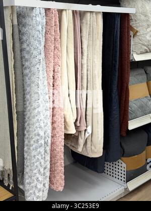 Different assortment of colorful clothing in the modern boutique Stock ...