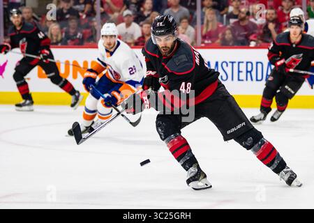 Carolina Hurricanes' Jordan Martinook (48) pesters Vancouver Canucks ...