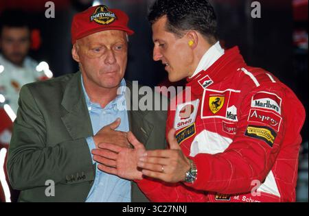 German motorsports racing driver Michael Schumacher on Ferrari F1 car ...