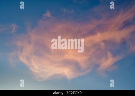 Soft wispy cloud formation against blue sky Stock Photo - Alamy