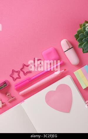 Open notebook with pencil on pastel purple background. Flat lay copy ...