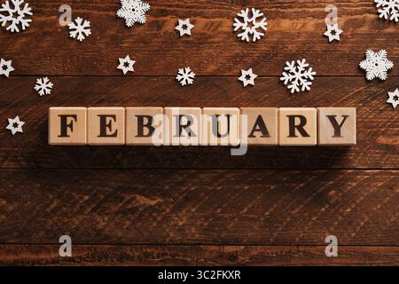 White wood calendar blocks with the date February 20th. Selective focus ...