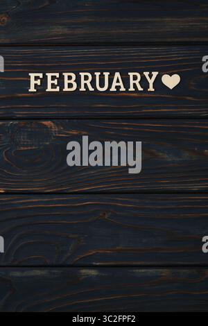 February month banner - word in vintage letterpress wood type against ...