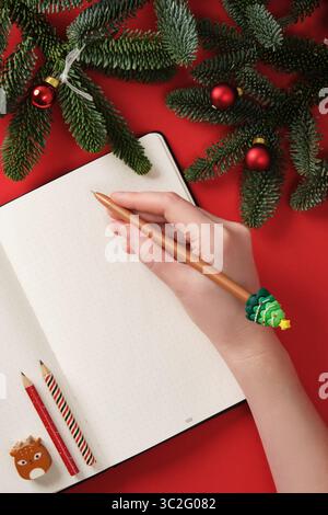 Writing plans in a notebook on a Wednesday afternoon Stock Photo - Alamy