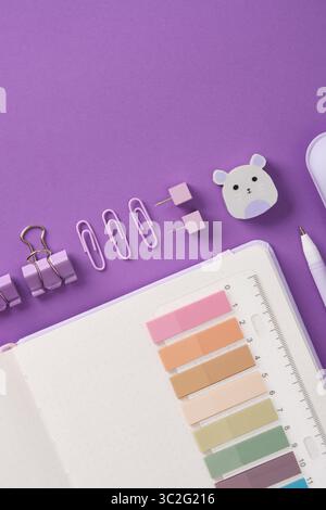 Open notebook, pen and pins on pink background Stock Photo - Alamy