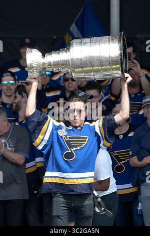 St. Louis Blues goalie Jordan Binnington, left, and Pius Suter, right ...