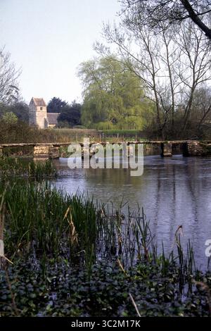 Clapper Bridge over the River Leach, Eastleach, Gloucestershire Stock ...