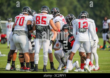 The Atlanta Falcons offense huddles during the second half of an NFL ...