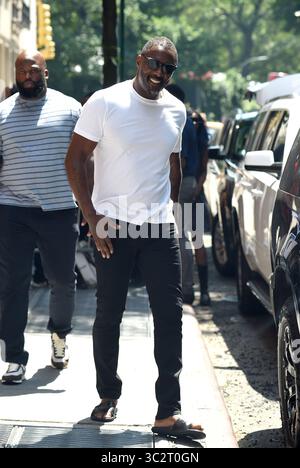 New York - NY - 20190730 Idris Elba is all smiles as he wears a black ...