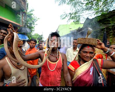 Snake Charmers seen showing different tricks with the venomous Snake's during the Jhapan ...