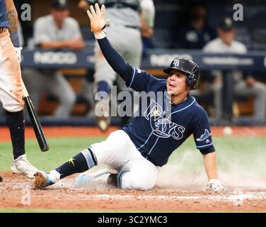 Seattle Mariners relief pitcher Matt Brash holds up the trident to ...