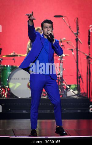 Joe Jonas of The Jonas Brothers performs in concert at the Mizner Park ...